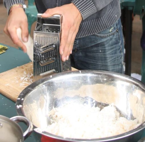 Cassava-grating – Permaculture College Australia